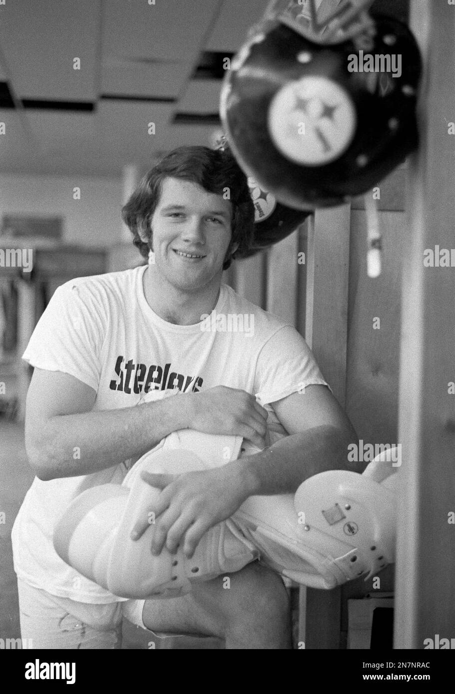 Jack Ham (59) linebacker for the Pittsburgh Steelers puts away his ...