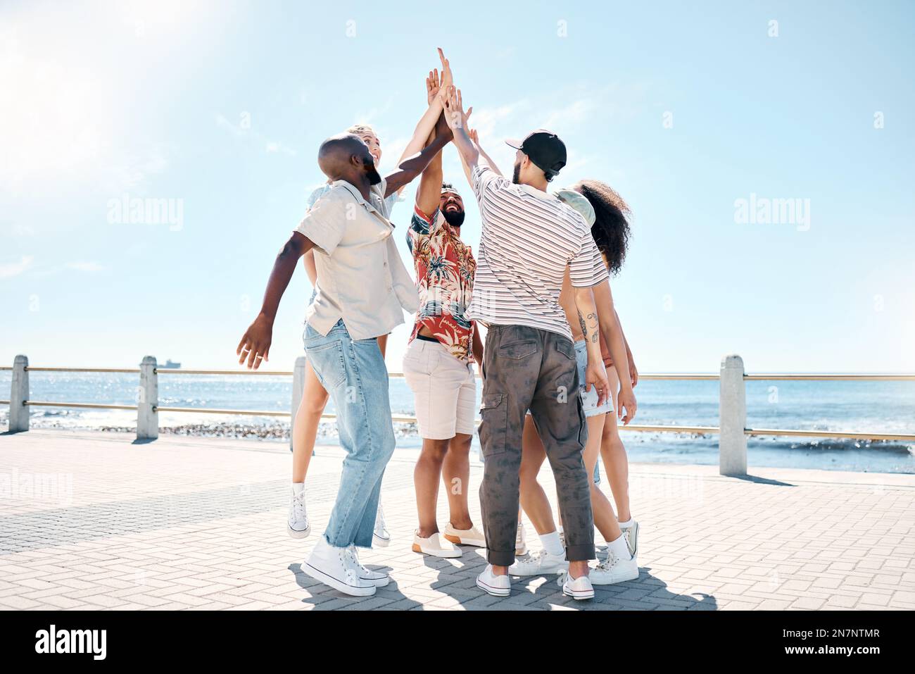 Heres to the most fun weve ever had. Full length shot of a diverse ...