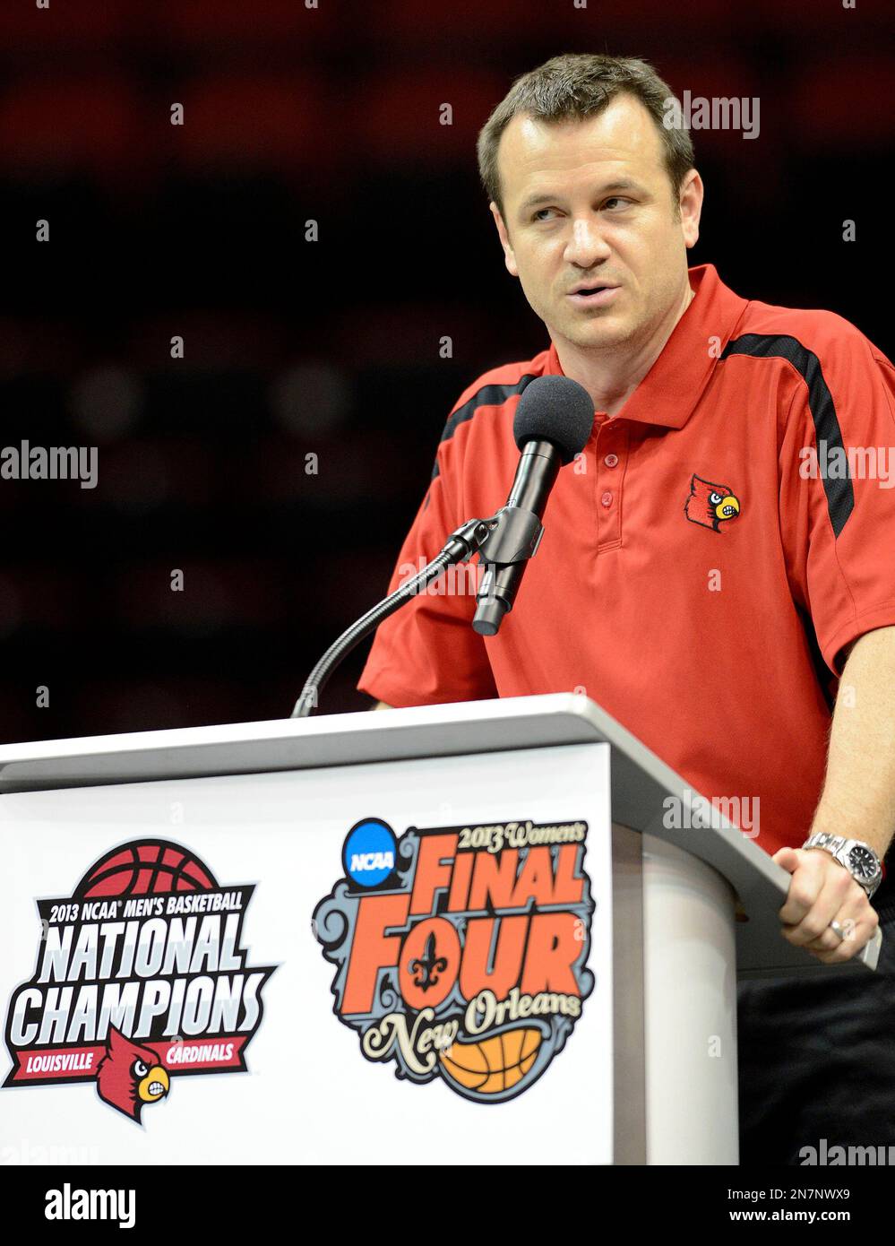 Louisville women's head coach Jeff Walz addresses the crowd at a ...
