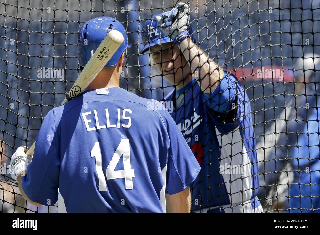 Los Angeles Dodgers' Mark Ellis talks with A.J. Ellis during warm ups ...