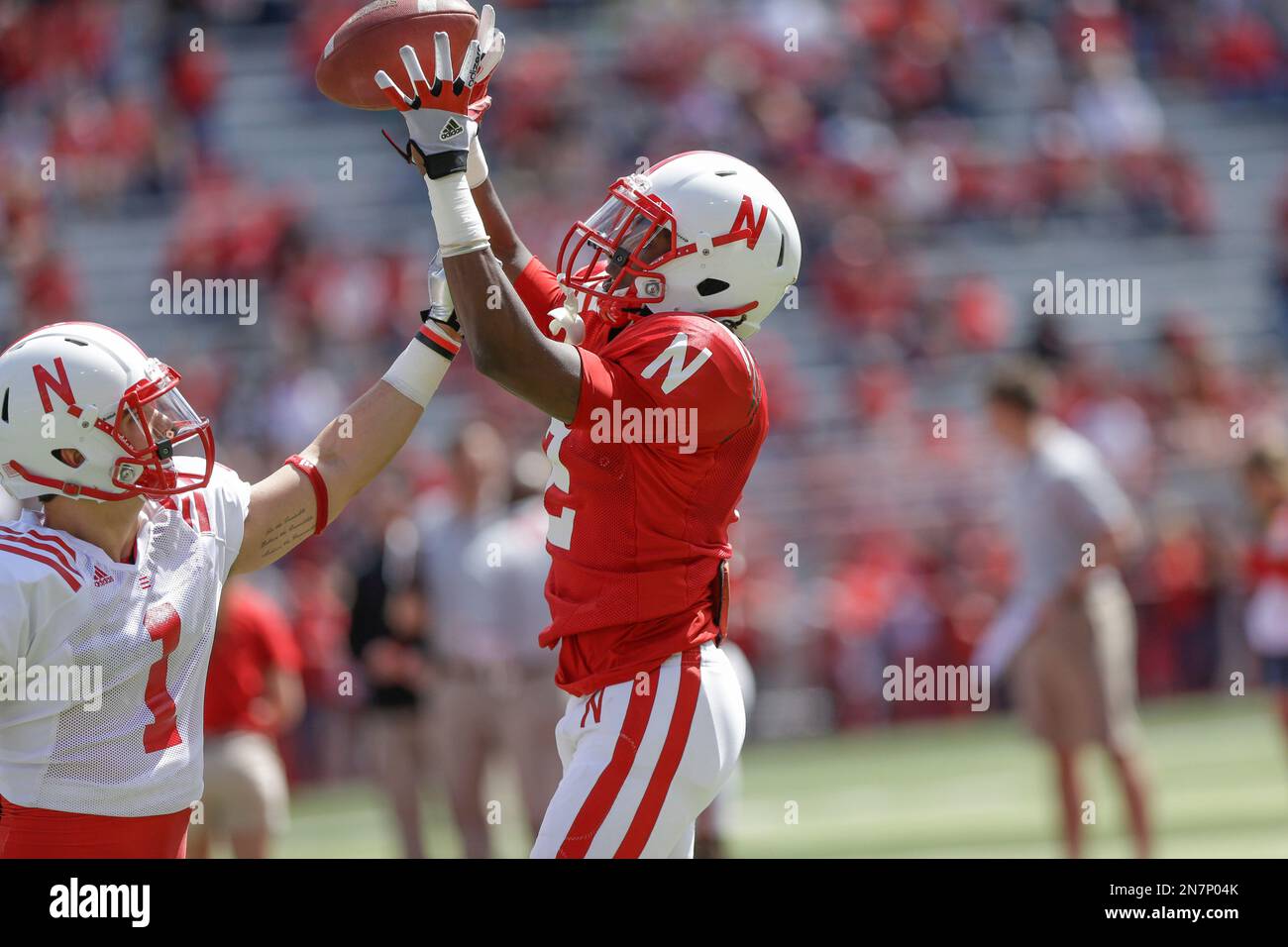 Jordan Westerkamp, left, and Alonzo Moore during warmups prior to the ...