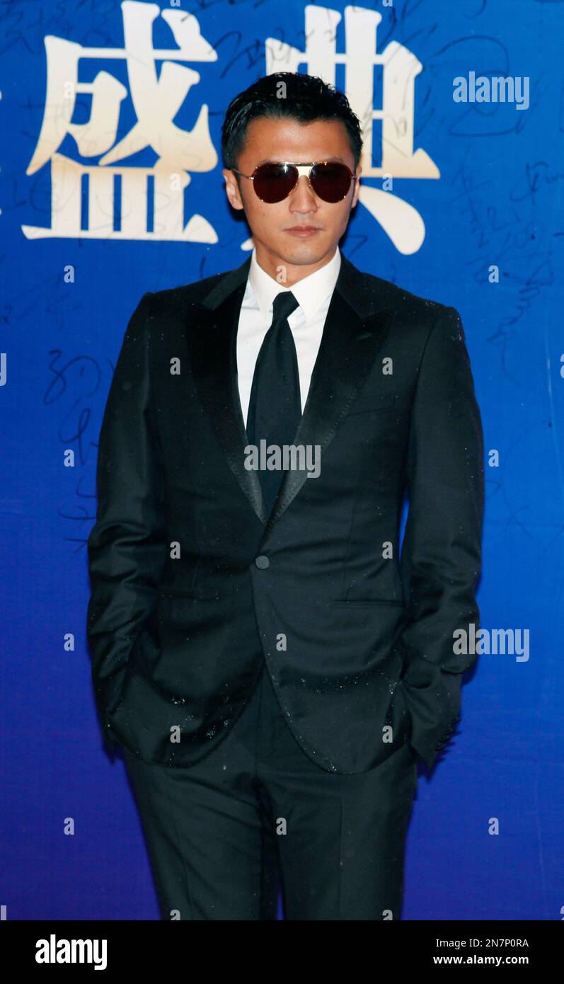 Hong Kong actor Nicholas Tse poses on the red carpet at the Huading ...