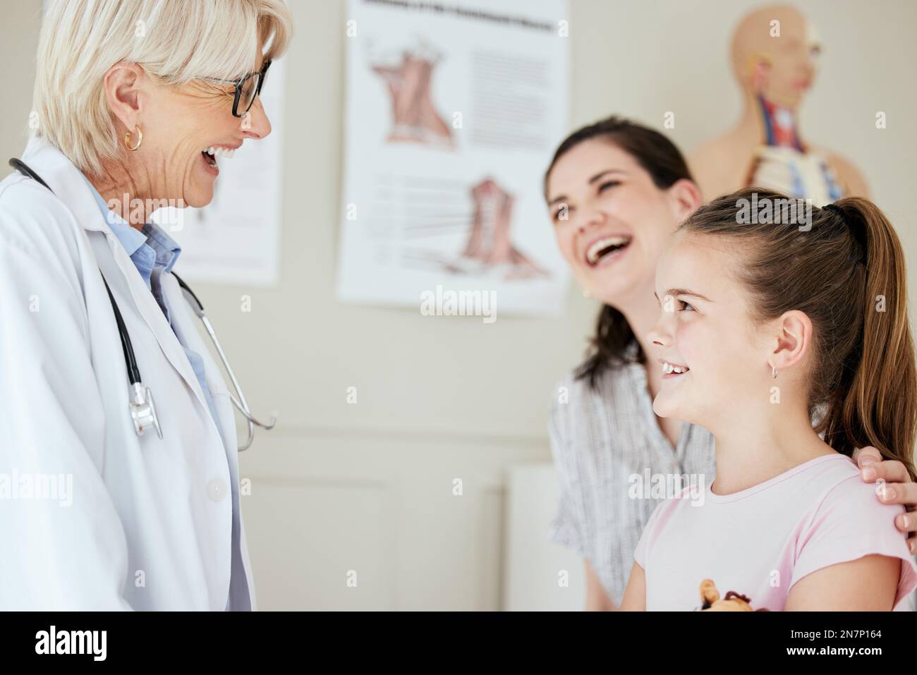 Checkups dont have to be serious. a little girl at a checkup at a ...