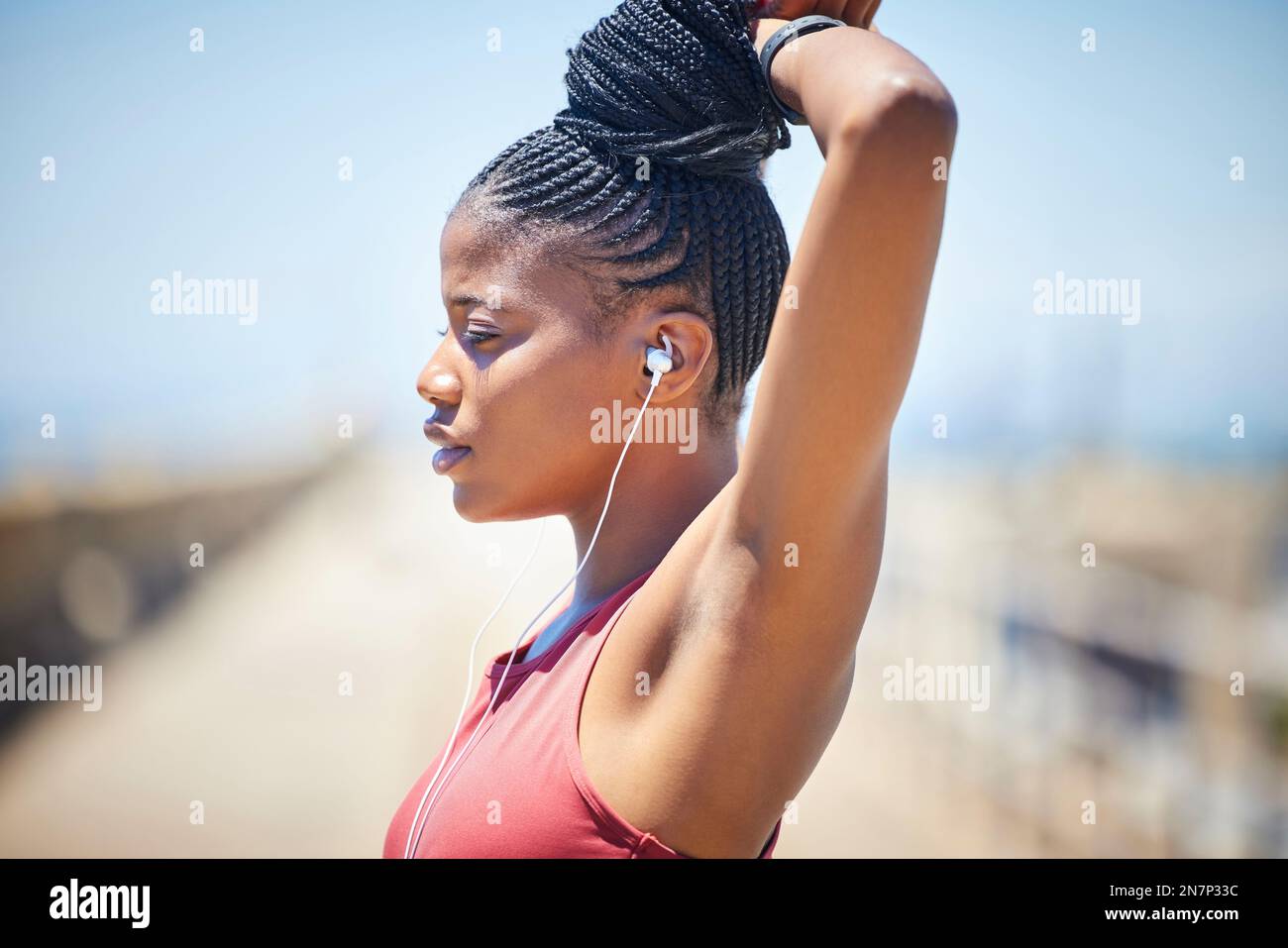 Fitness, black woman and stretching outdoor with earphones for exercise ...