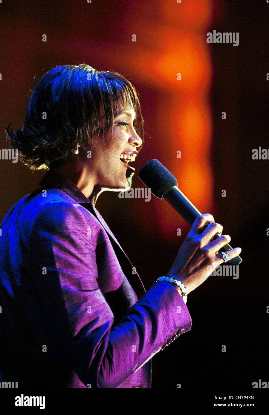 FILE - In this photograph taken Jan. 15, 2000, Whitney Houston sings ...