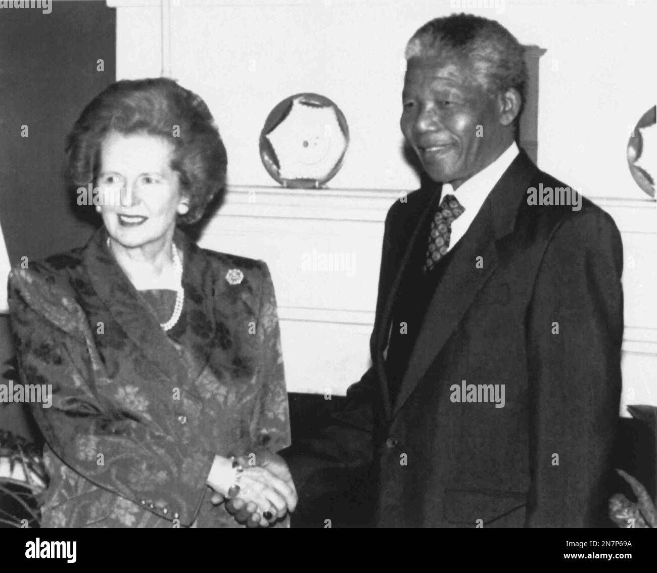 File- In this picture taken July 4, 1990, British Prime Minister ...
