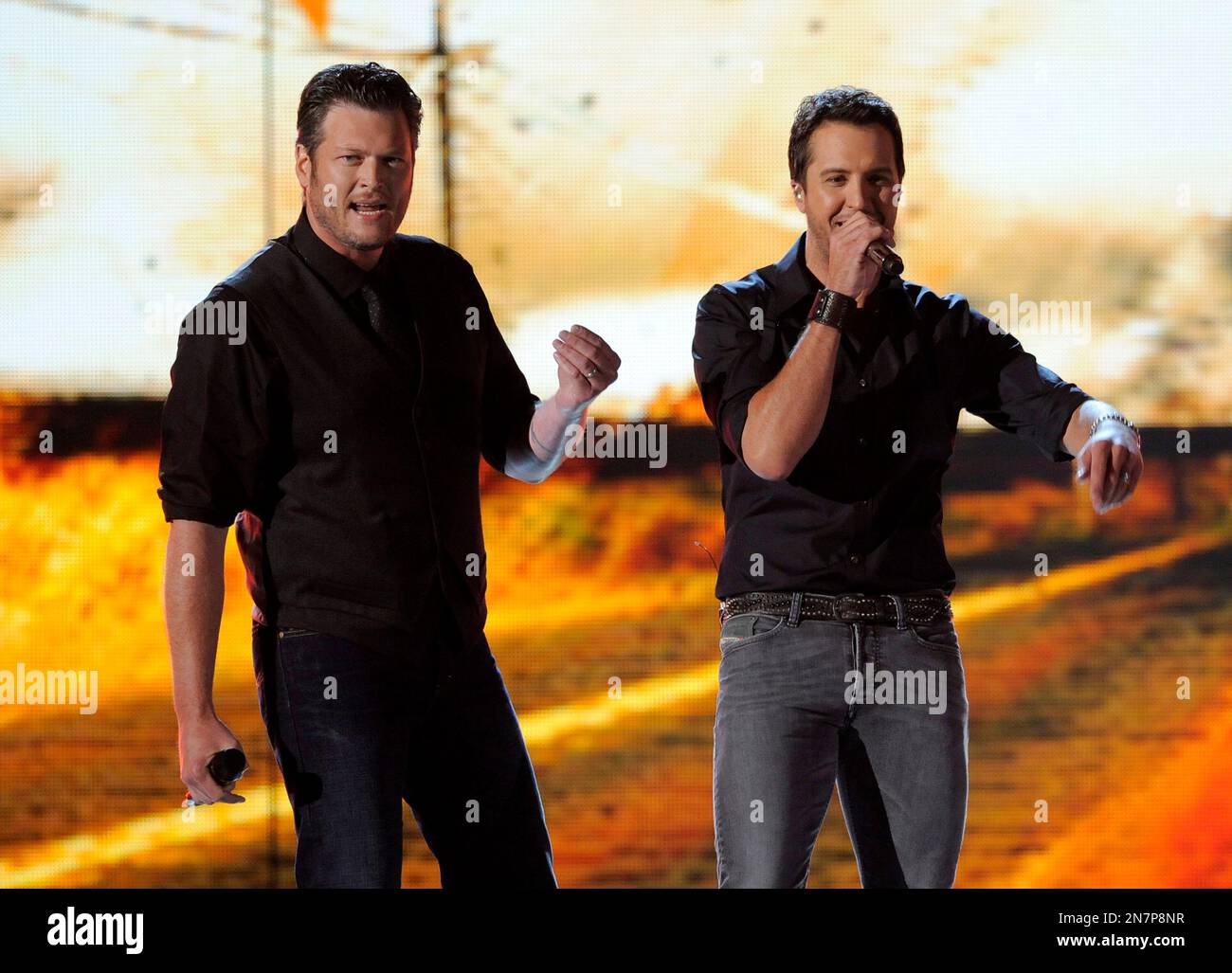 Blake Shelton, left, and Luke Bryant perform on stage at the 48th ...