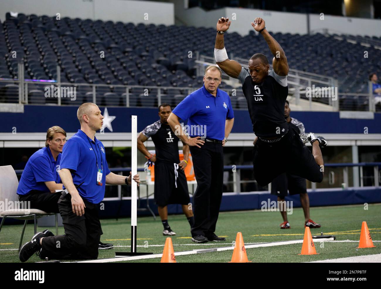 Combine staff member Mike Kozak, left front, Joe Wetzel, left rear, and ...