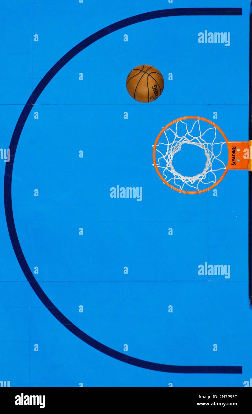 The ball head to the hoop during an NBA basketball game between the ...