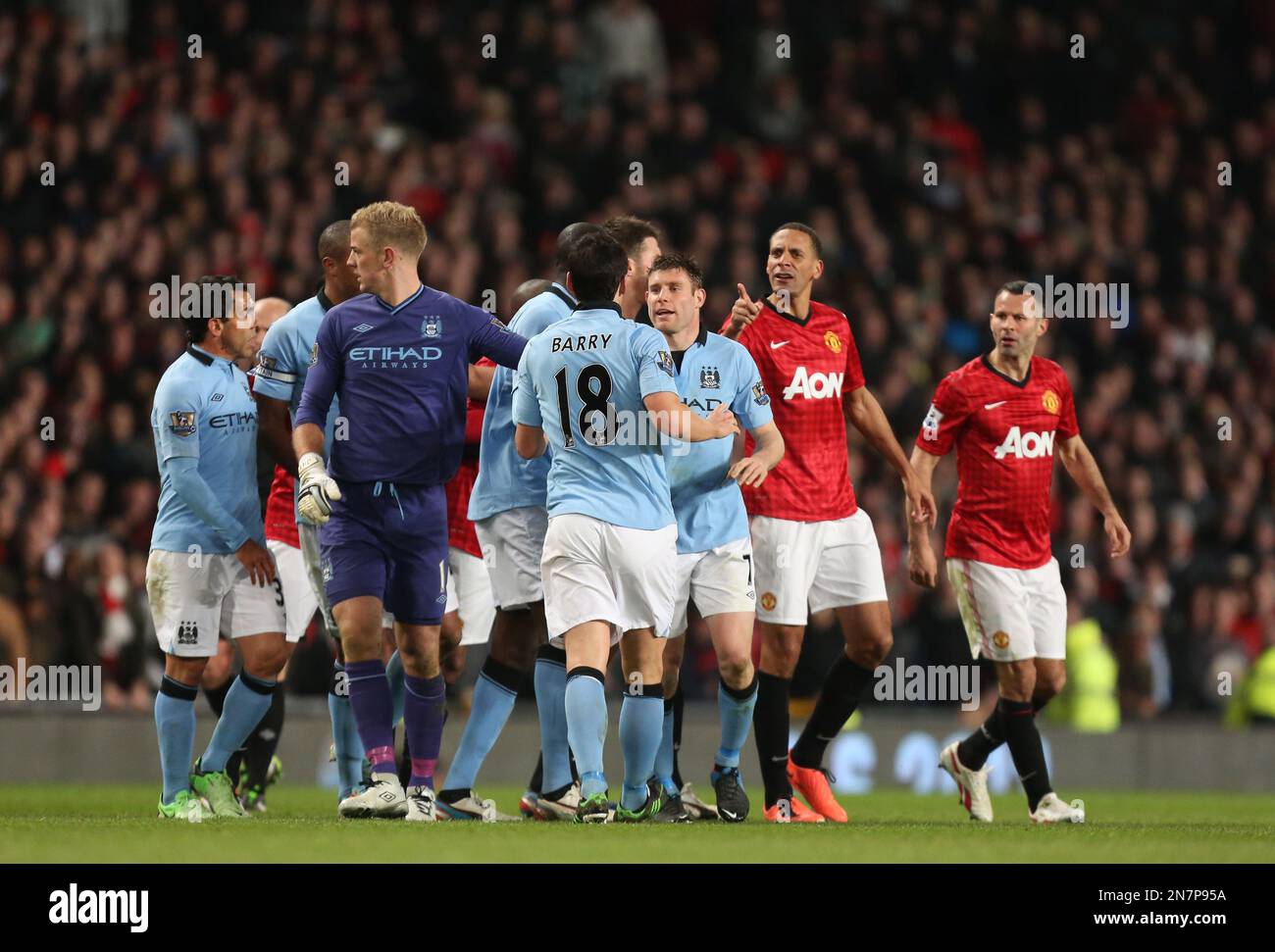 Manchester United's Rio Ferdinand, second right, remonstrates with ...