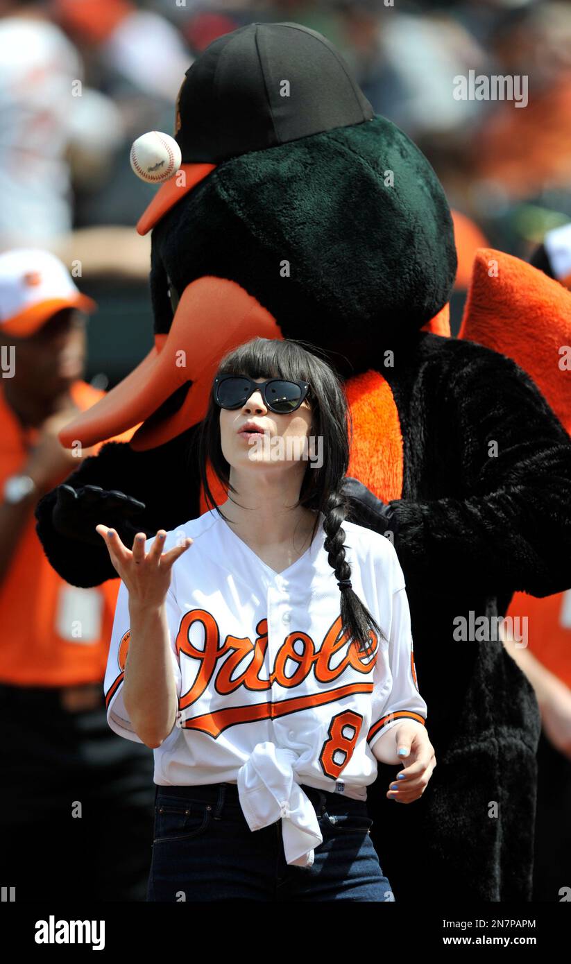 Canadian recording artist Carly Rae Jepsen tosses a baseball before ...