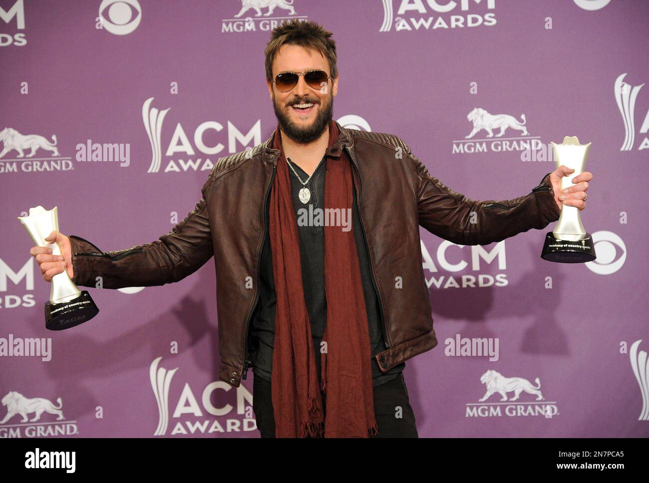 Eric Church poses backstage with the awards for album of the year for ...