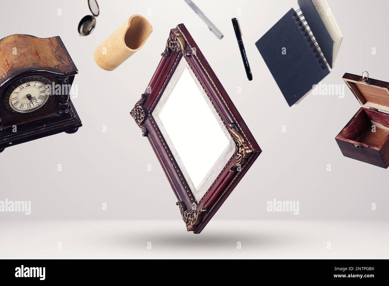 flying frames on the air, with equipments and objects mockup Stock Photo - Alamy