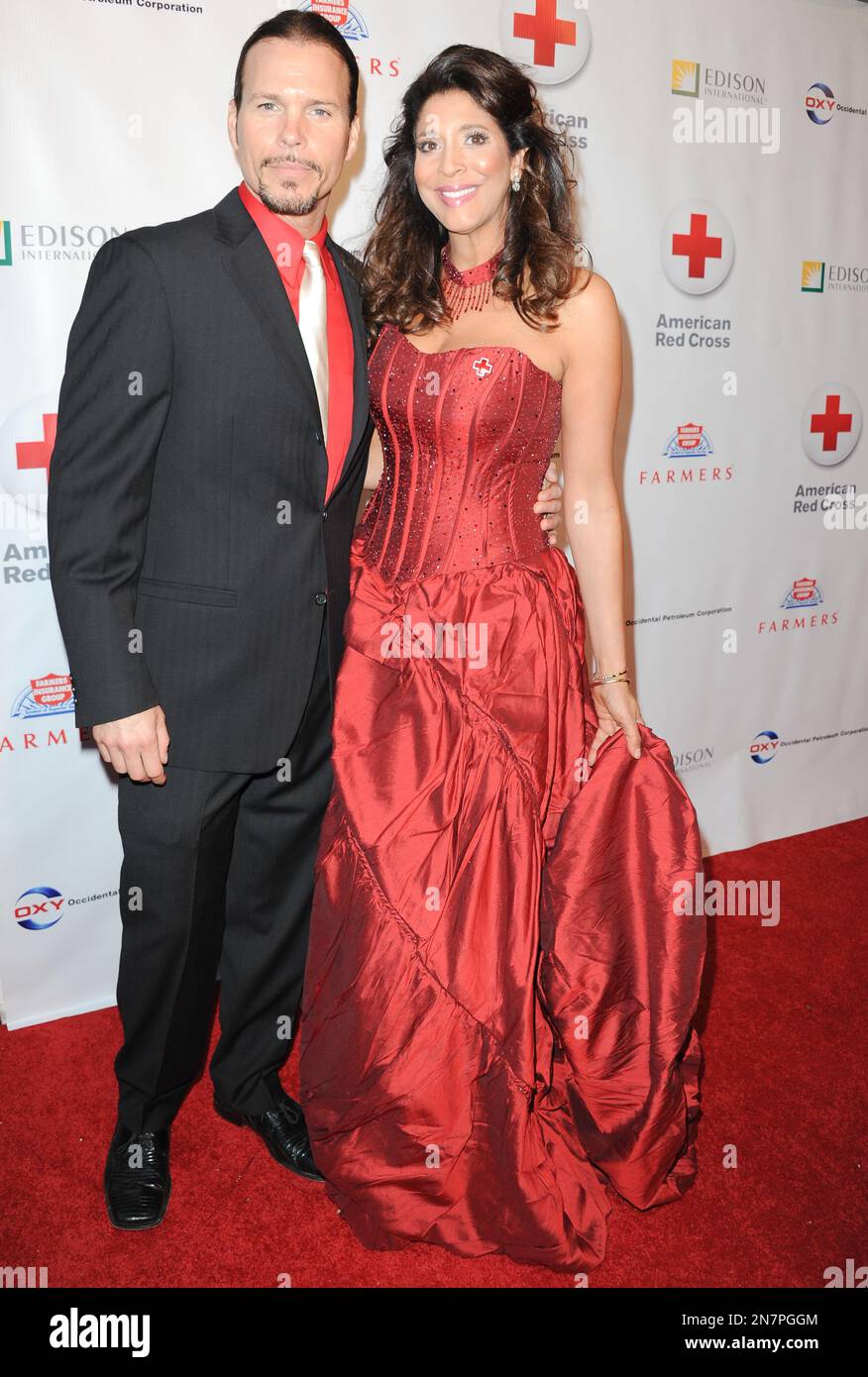 Sean McNabb, left, and Christine Devine arrive at the American Red Cross 7th Annual Red Tie ...