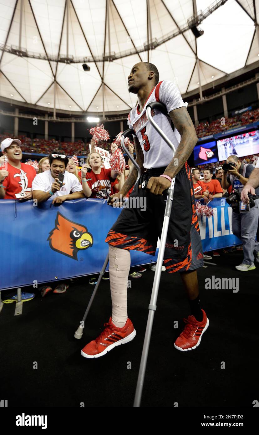 Louisville's Kevin Ware makes his way to the court before the start of ...