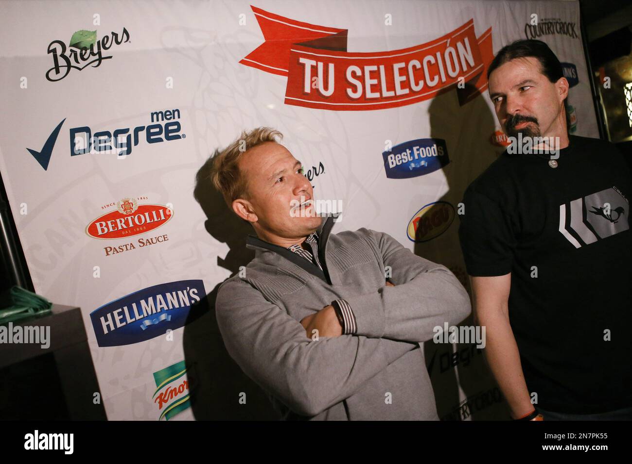 Soccer legends Marcelo Balboa, right, and Luis Hernandez enjoy the Unilever Tu Seleccion launch ...