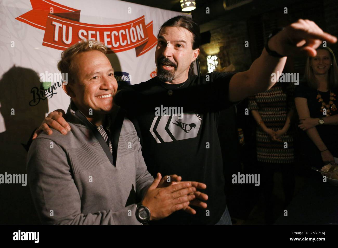 Soccer legends Marcelo Balboa, right, and Luis Hernandez enjoy the Unilever Tu Seleccion launch ...