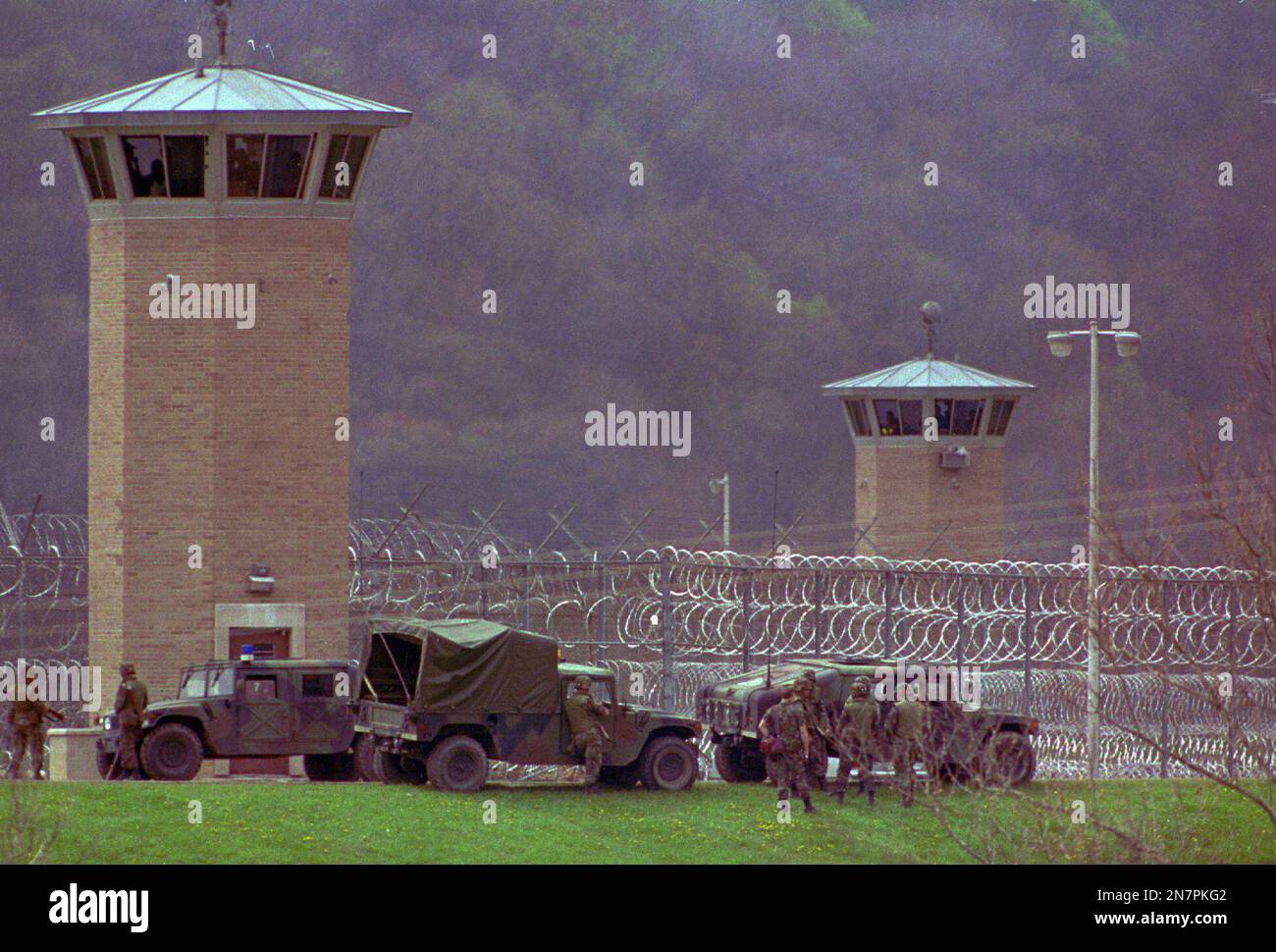 FILE - This April 28, 1993 file photo shows law officers and National ...