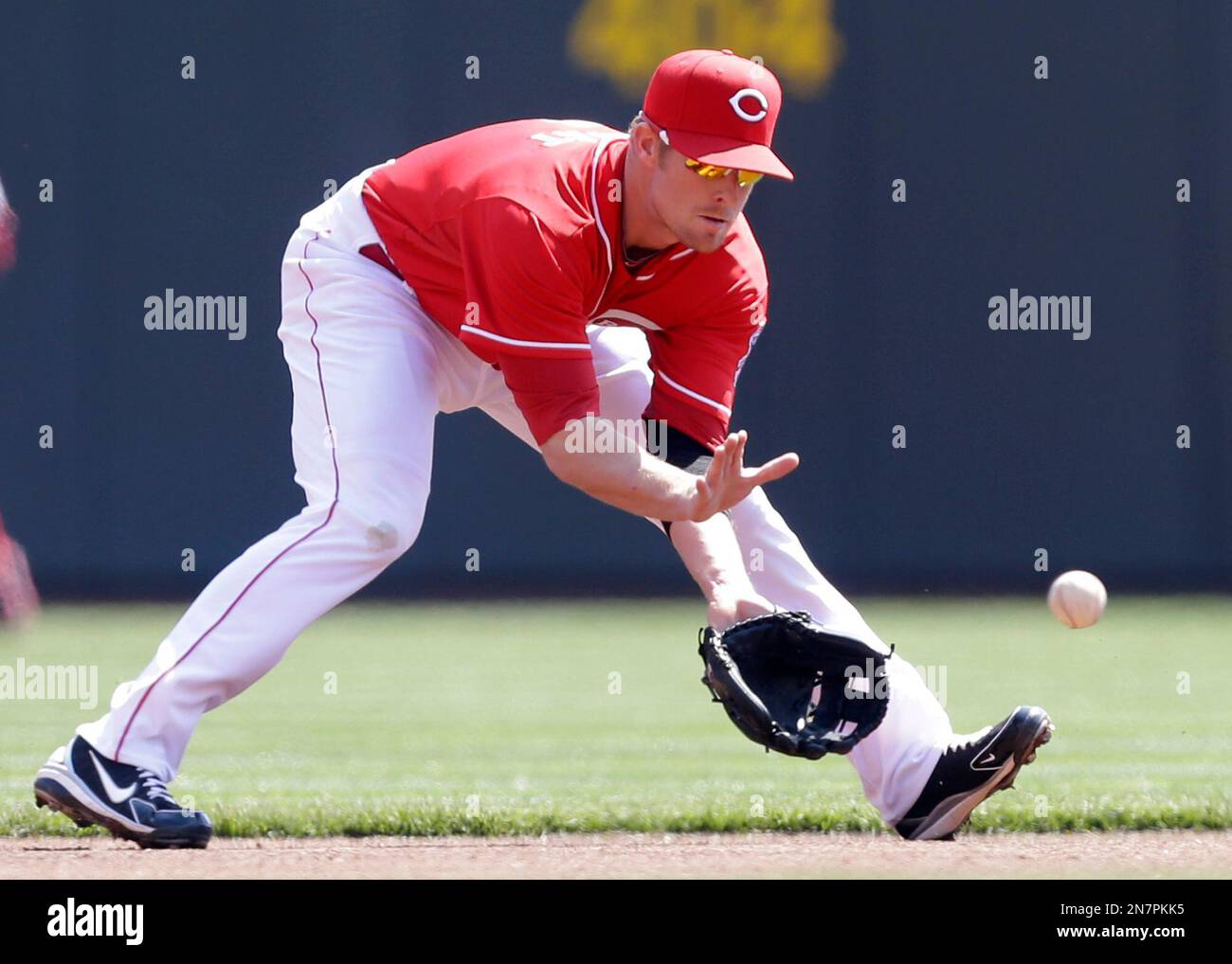 Cincinnati Reds shortstop Zack Cozart fields a ground ball hit by ...
