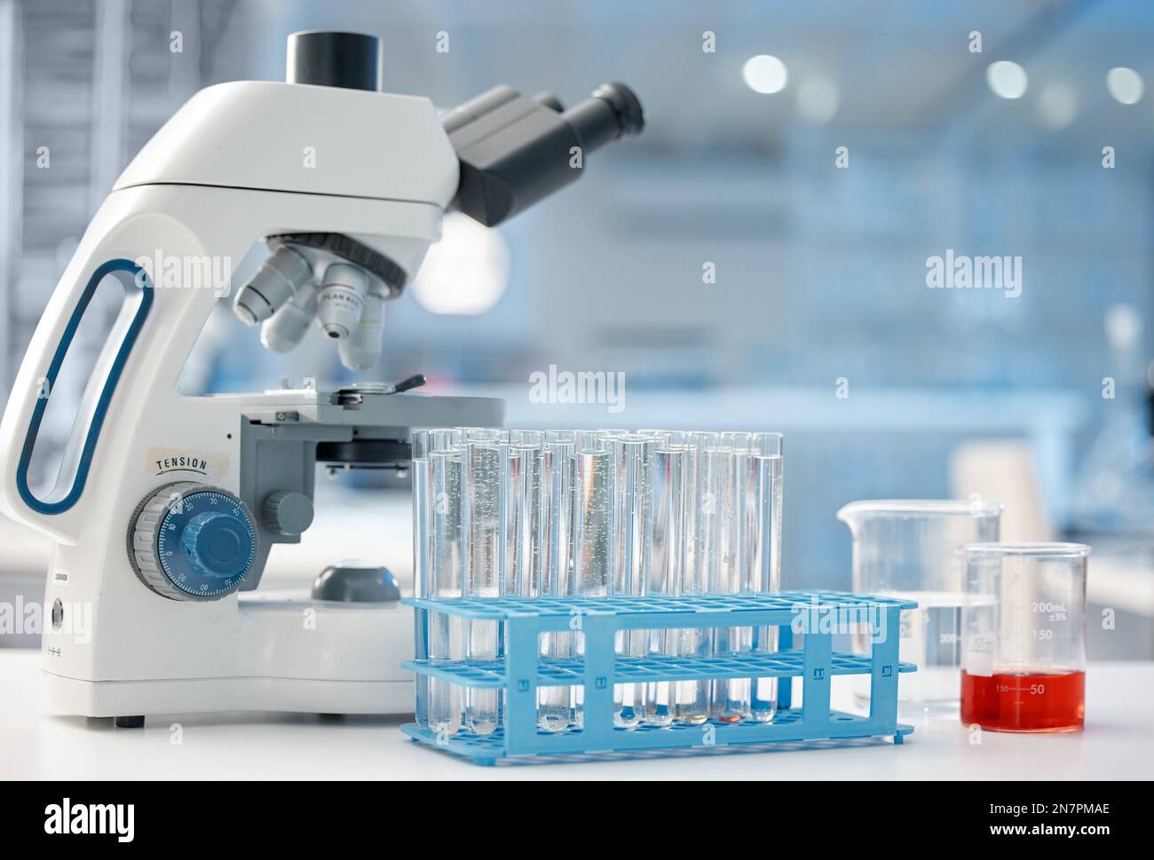 Couldnt work without these. an empty lab with a tray of test tubes and ...