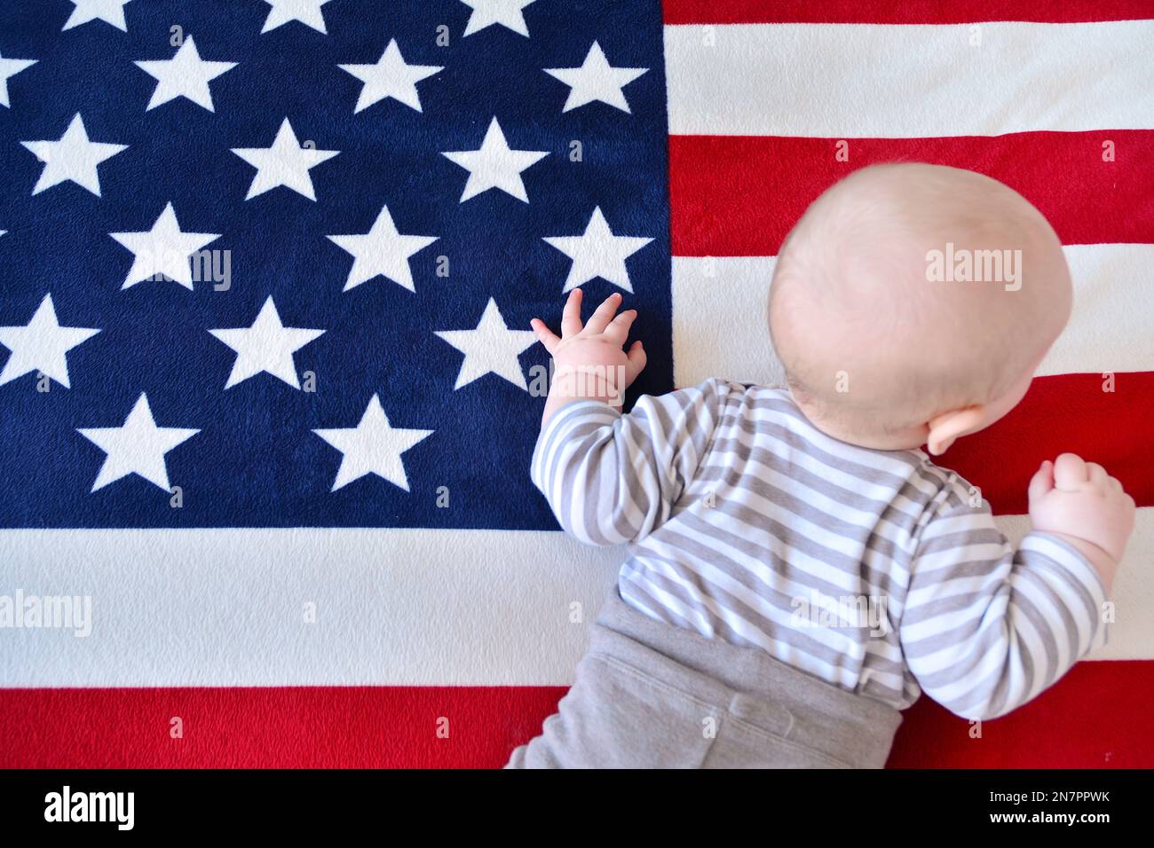 Baby on American flag background. Son of america Stock Photo - Alamy
