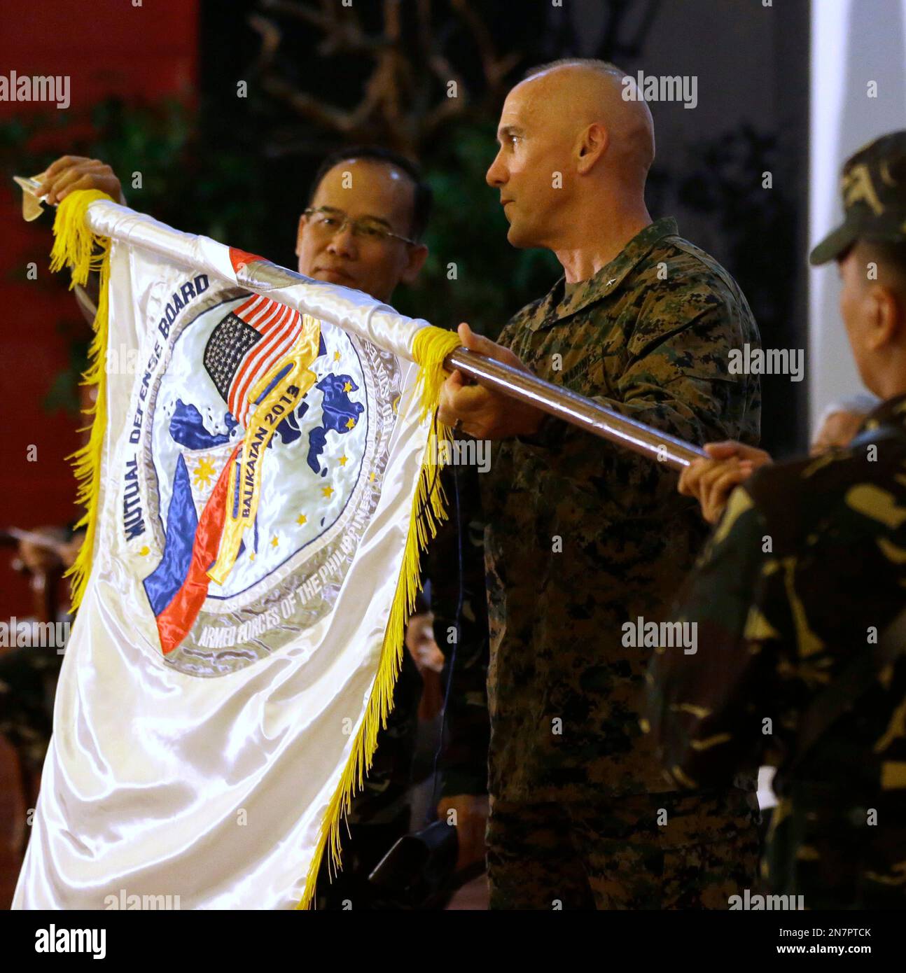 US Marine Brig. Gen. Richard Simcock II, center, Philippine Army Maj ...