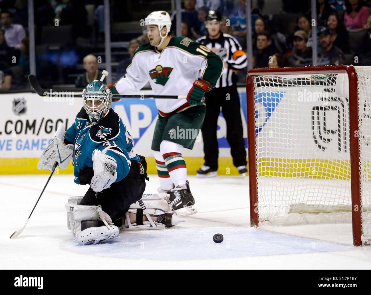 A shot by Minnesota Wild's Dany Heatley, not pictured, gets past San ...