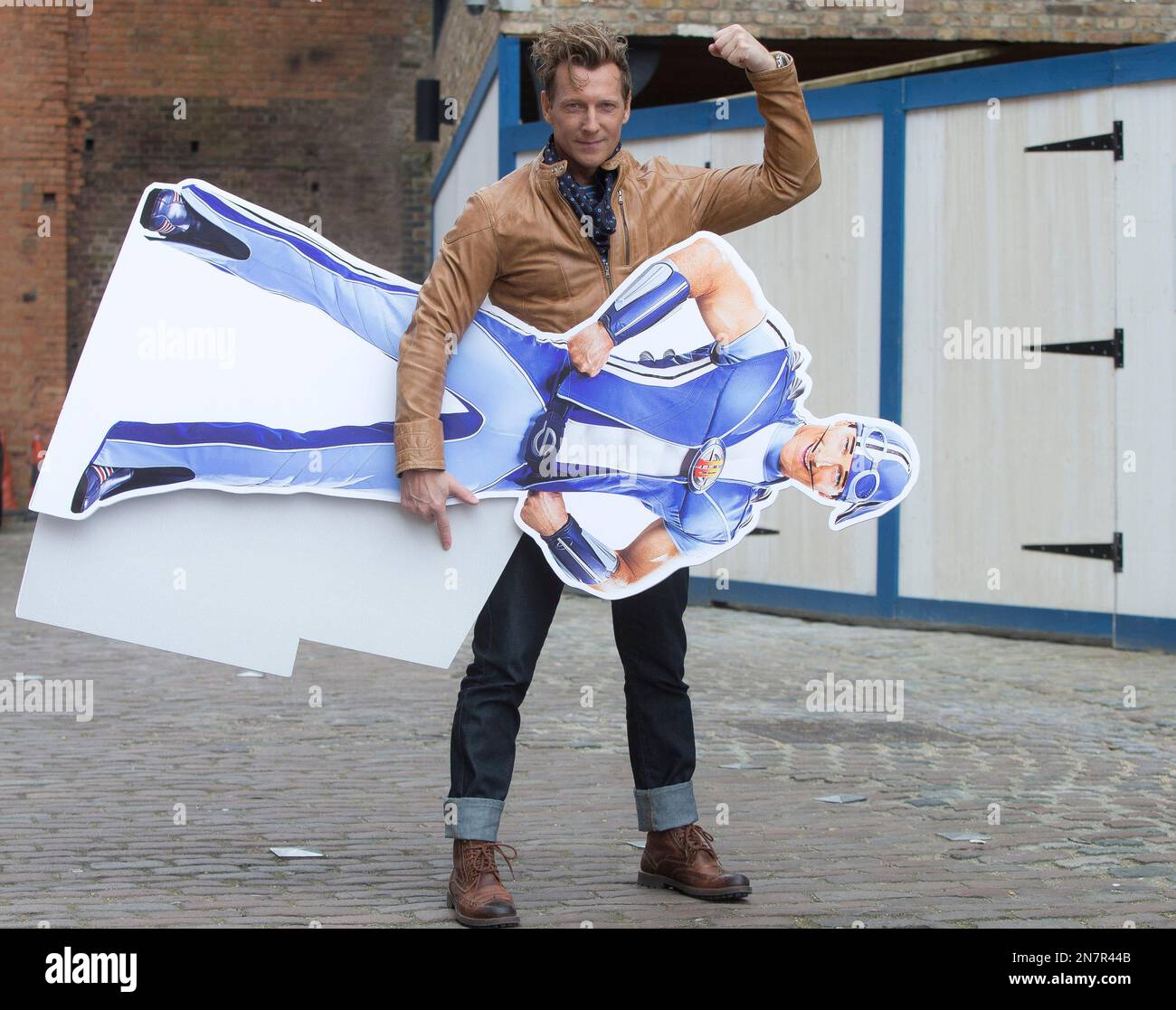 Magnus Scheving, the creator and co-star of LazyTown, holds a cardboard ...