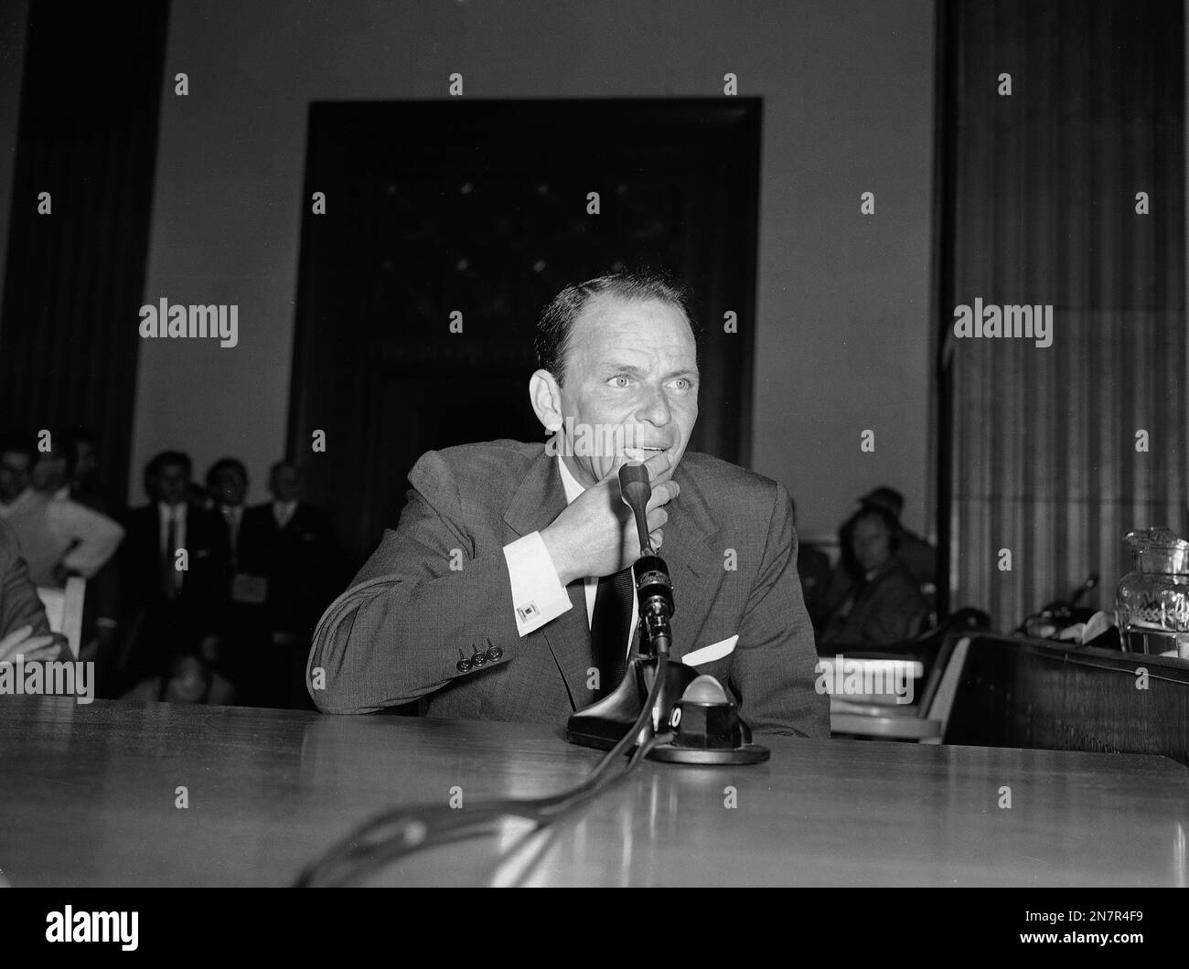 Crooner Frank Sinatra tells a state legislative committee his only part ...