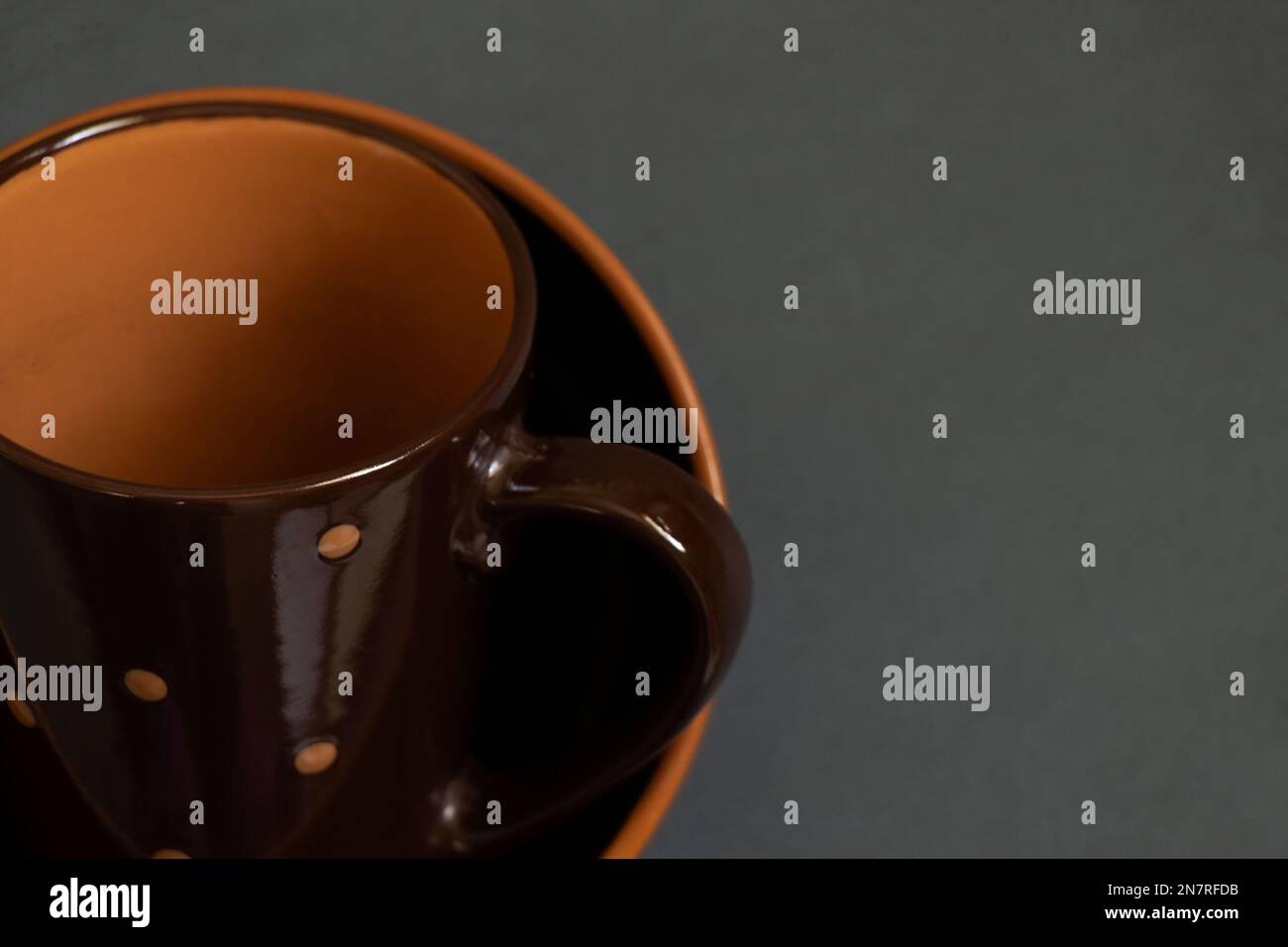 set of identical cups and a plate on an isolated background Stock Photo ...