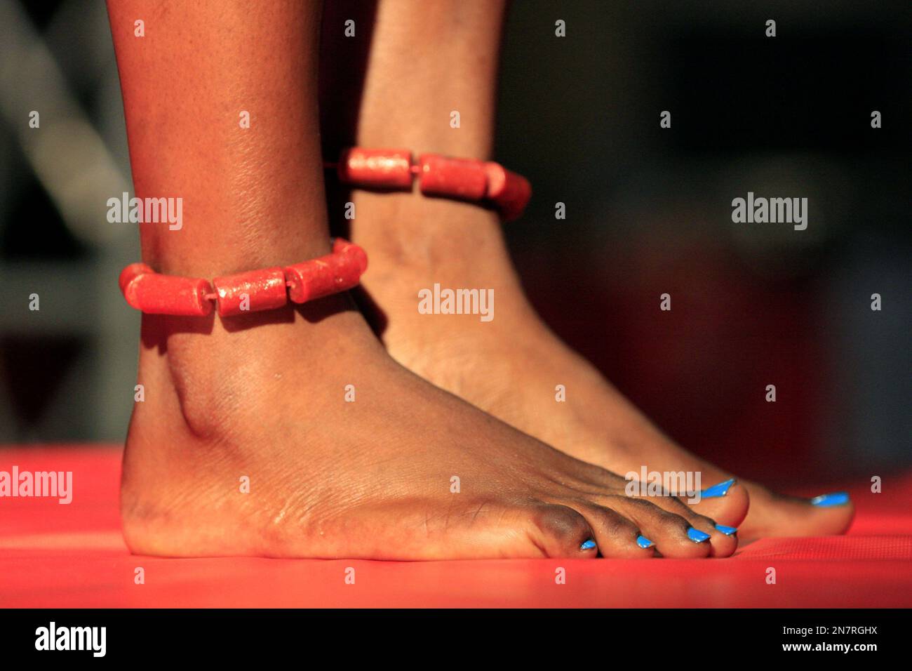 A contestant stands barefoot at the Lagos Carnival beauty pageant in ...