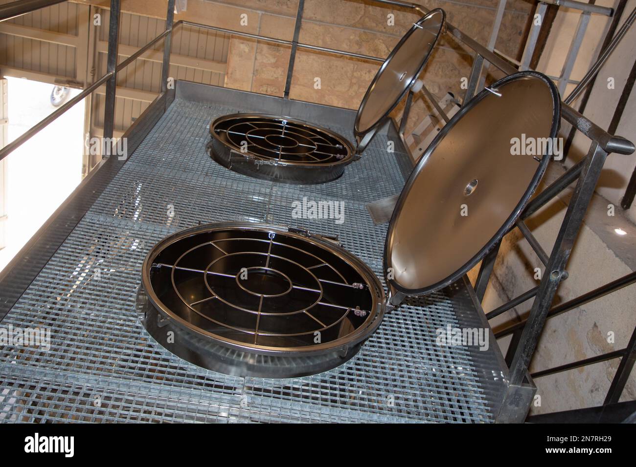 modern winemaking vats for fermenting grapes and producing wine at the ...