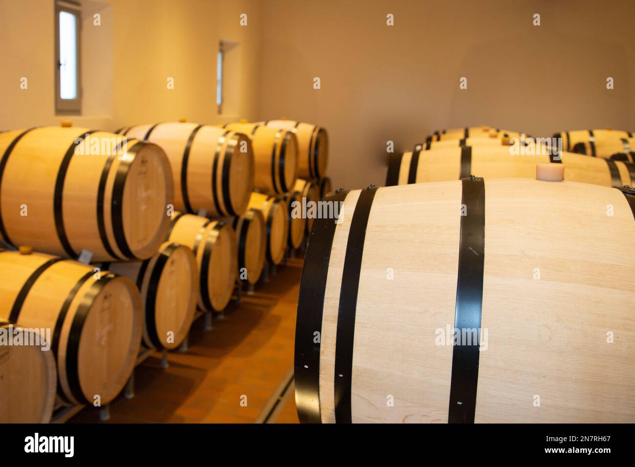 wood barrel of wine in the cellar in Bordeaux France Stock Photo - Alamy
