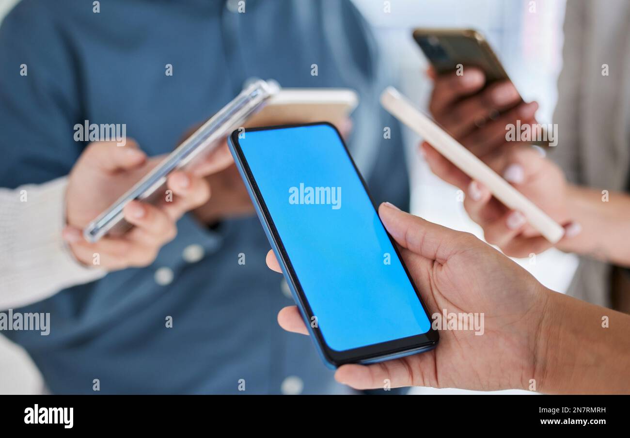 Green screen, mockup and smartphone in hands, team with marketing and ...