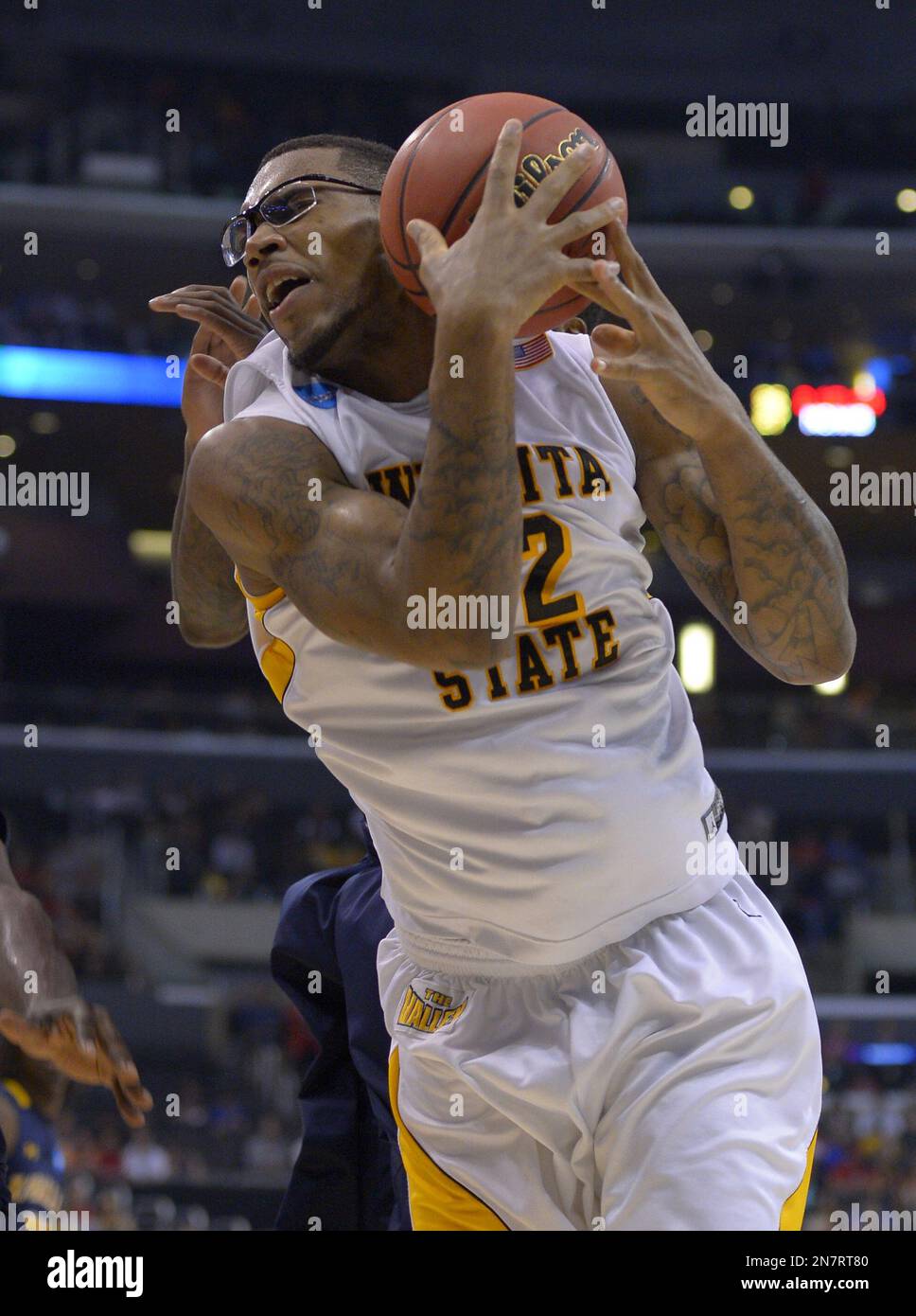 Wichita State forward Carl Hall pulls down a rebound during the first ...