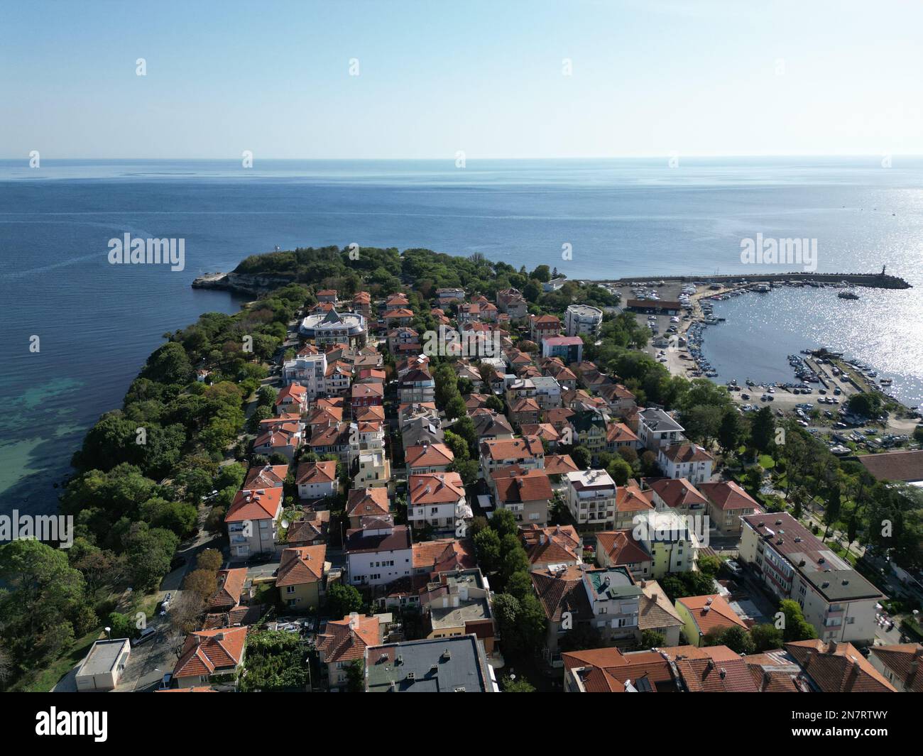 An aerial shot over the buildings of the waterfront town of Tsarevo in ...