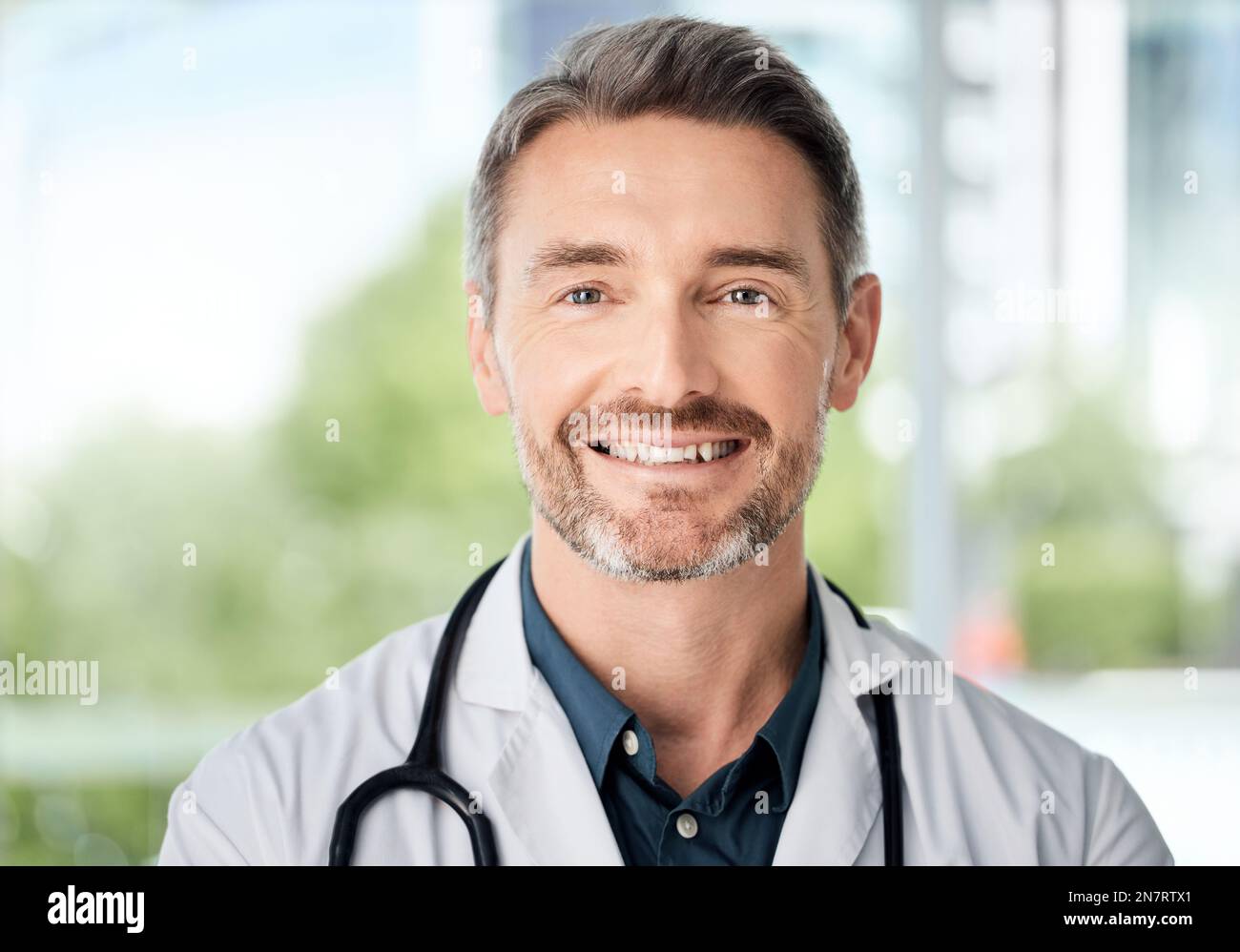 Quality and safety is number one in healthcare. a doctor standing in a ...