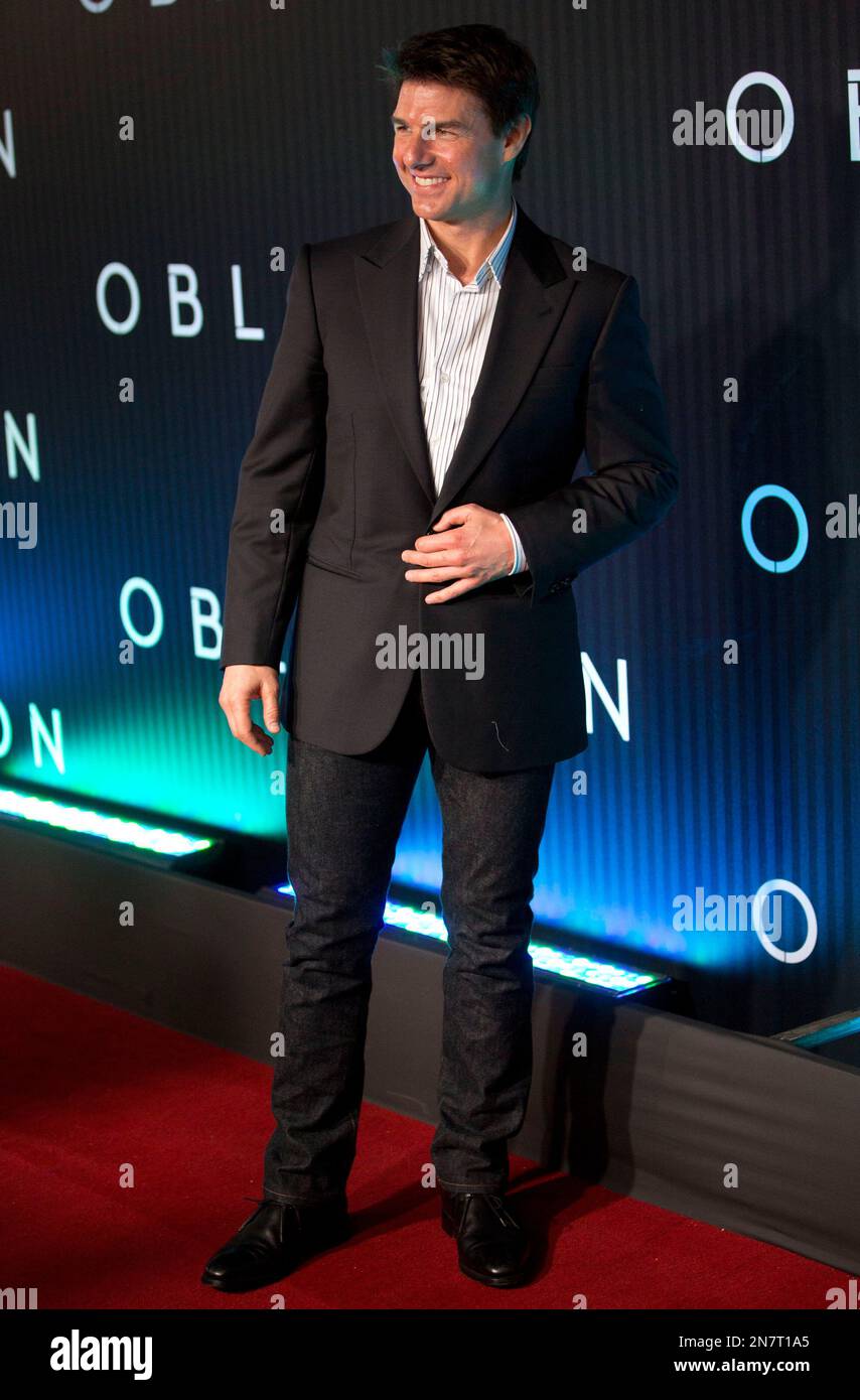 U.S. actor Tom Cruise poses for pictures upon his arrival to the ...
