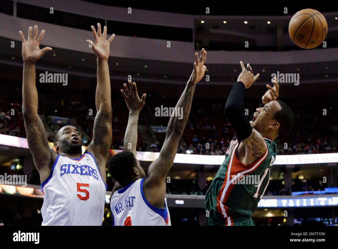 Milwaukee Bucks' Monta Ellis, right, cannot get a shot past ...