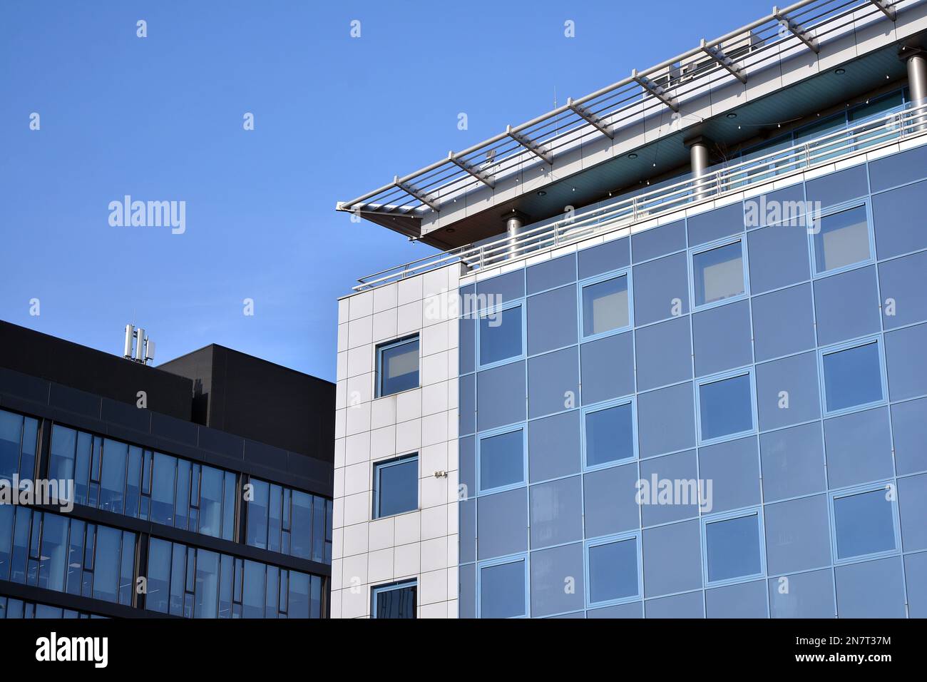 Wall of a modern commercial building with aluminum metal composite ...