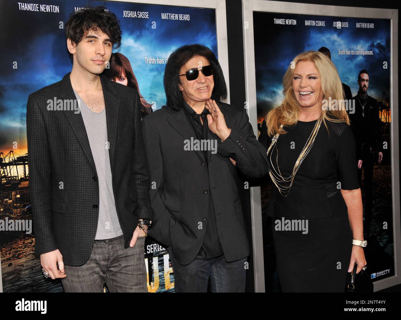 Gene Simmons poses with his son Nick and wife Shannon Tweed at the Los ...