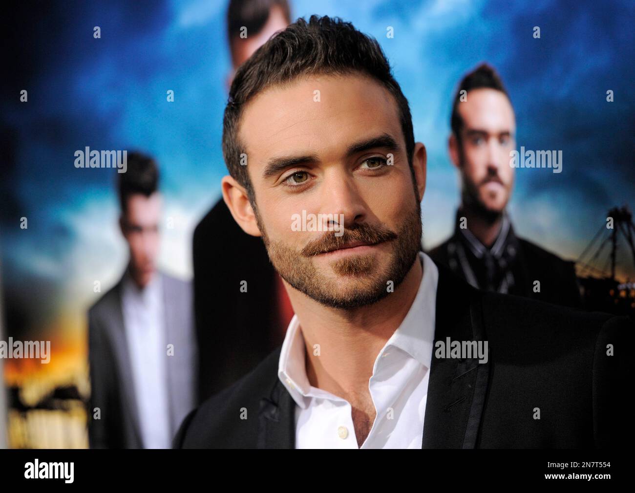 Joshua Sasse, a cast member in "Rogue," poses at the Los Angeles ...