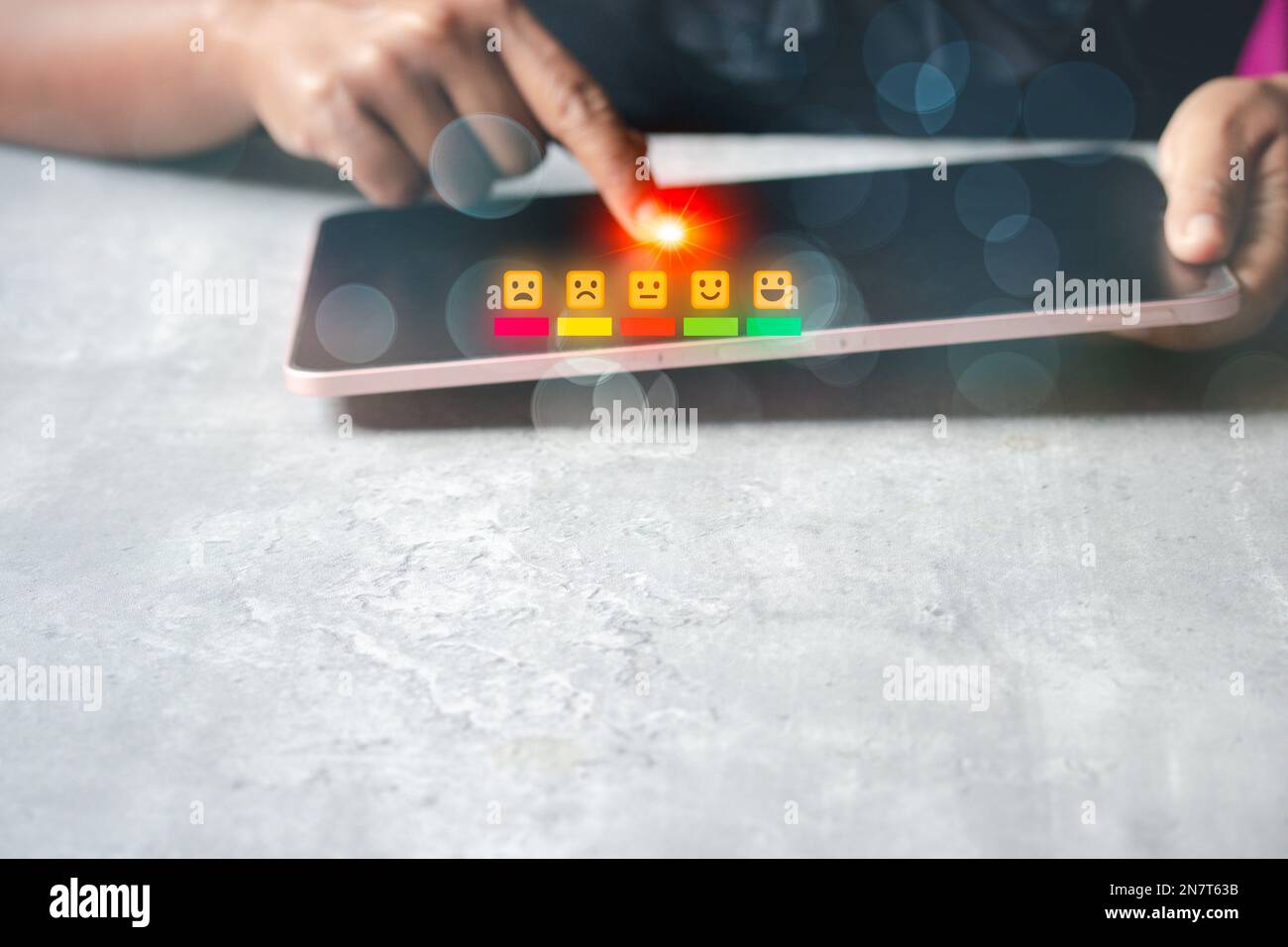 Customers use tablets to rate their satisfaction when shopping online ...