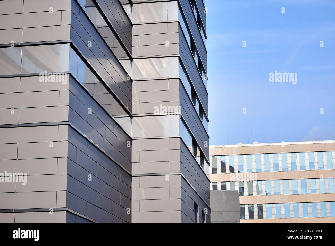 Wall of a modern commercial building with aluminum metal composite ...