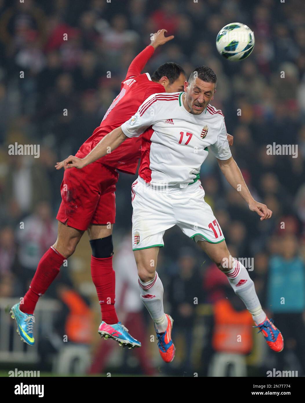 Turkey's Umut Bulut, rear, and Norbert Meszaros of Hungary fight for ...