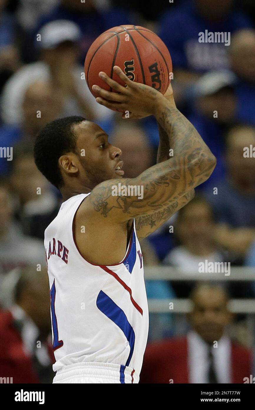 Kansas guard Naadir Tharpe (1) shoots during the first half of a third ...