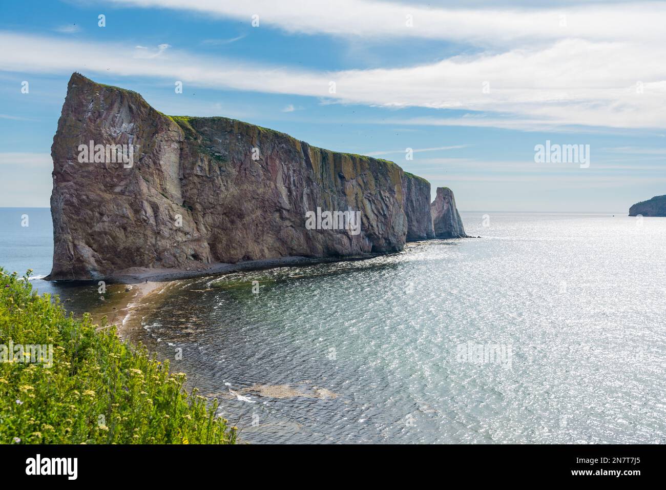 View of Percé Rock, a huge sheer rock formation in the Gulf of Saint ...