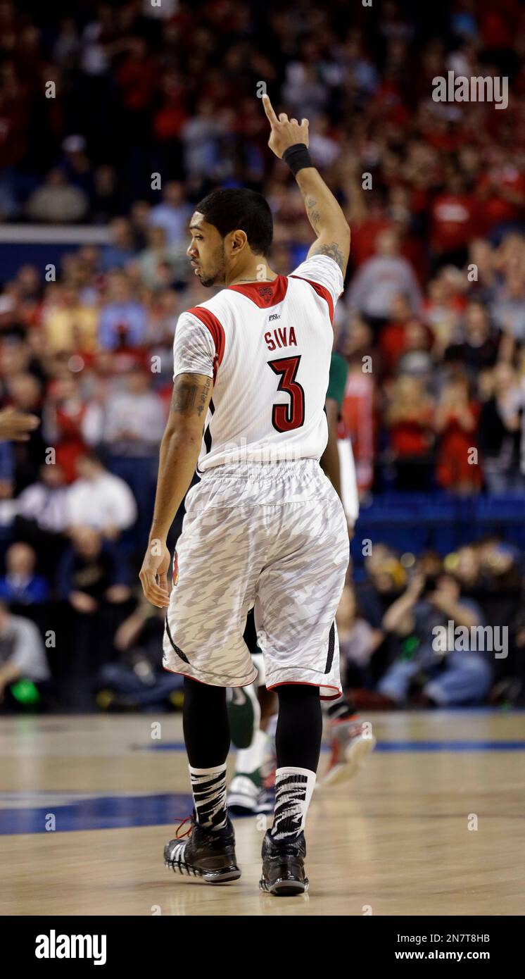 Louisville guard Peyton Siva (3) gestures in the second half of a third ...