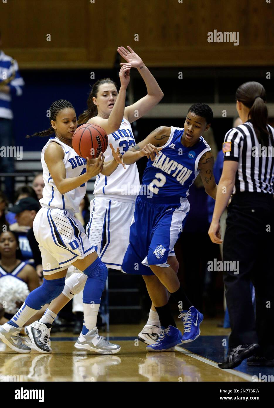 Duke's Chloe Wells (4) and Haley Peters guard Hampton's Nicole Hamilton ...