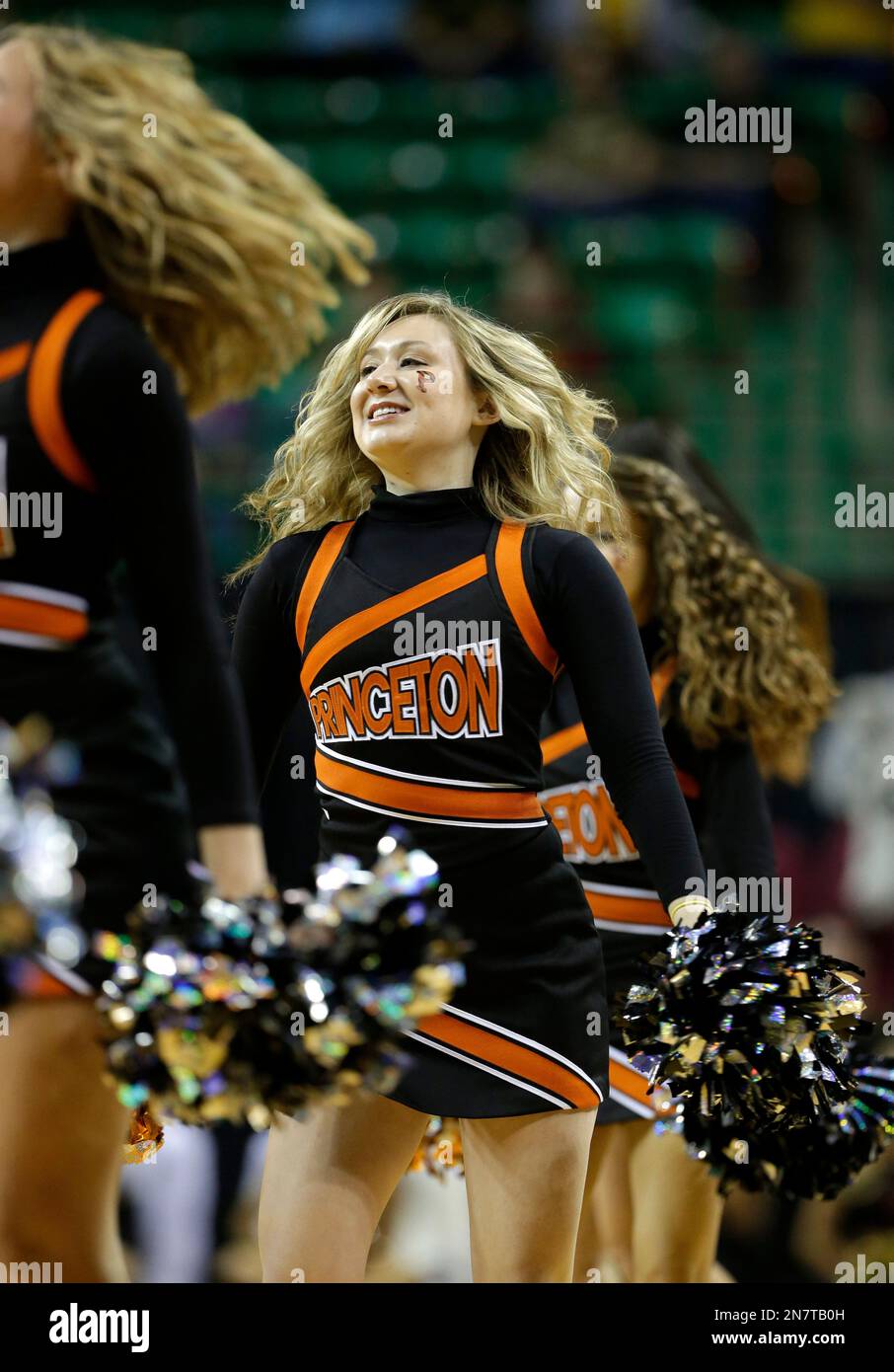 Members of the Princeton cheerleaders perform during a first-round game ...